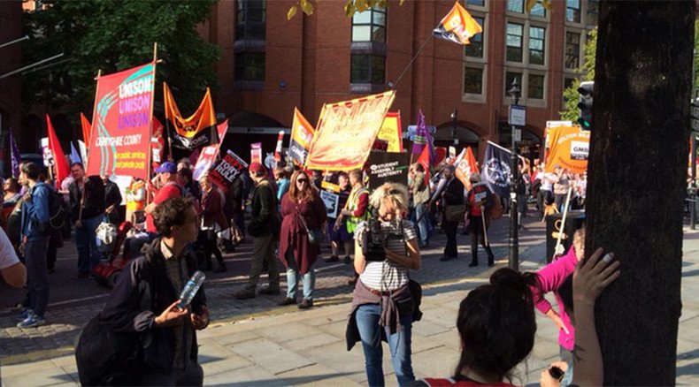 Tens of thousands march in Manchester to protest UK government’s ...