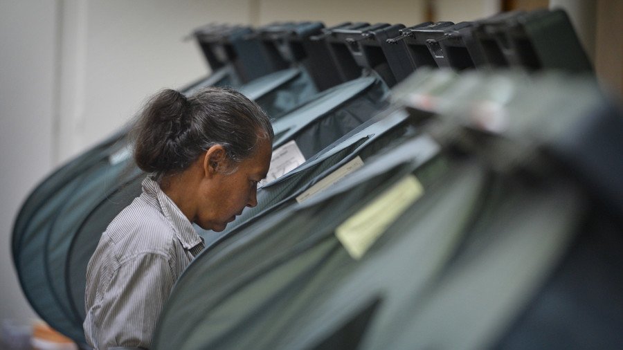 Solving world hunger, voting machines rigged, dark money pours in — RT ...