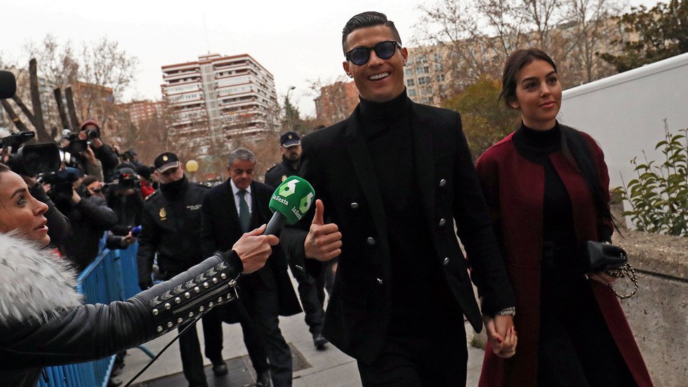 Dapper Ronaldo arrives at court grinning to accept €19mln fine & prison ...