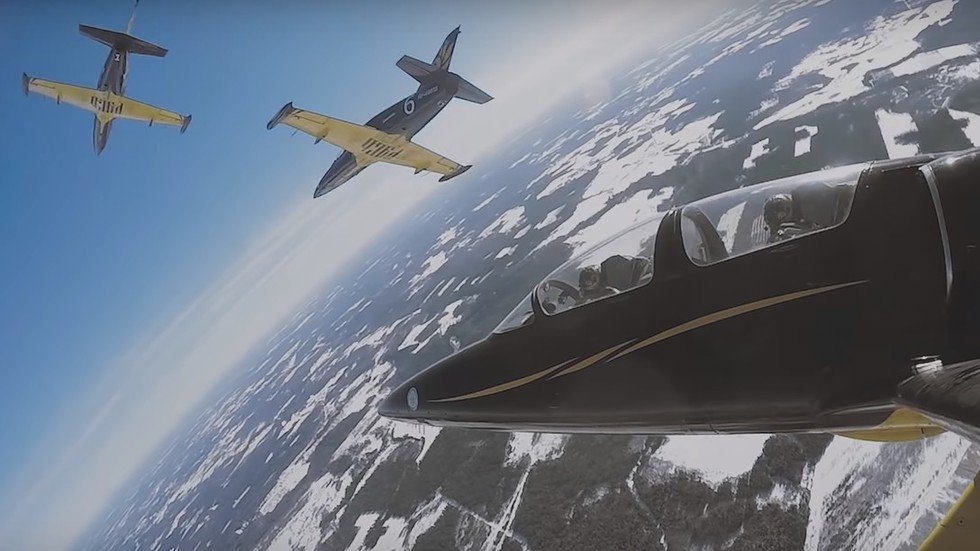 Russian pilots perform head-spinning stunts drawing ‘Captain Marvel ...