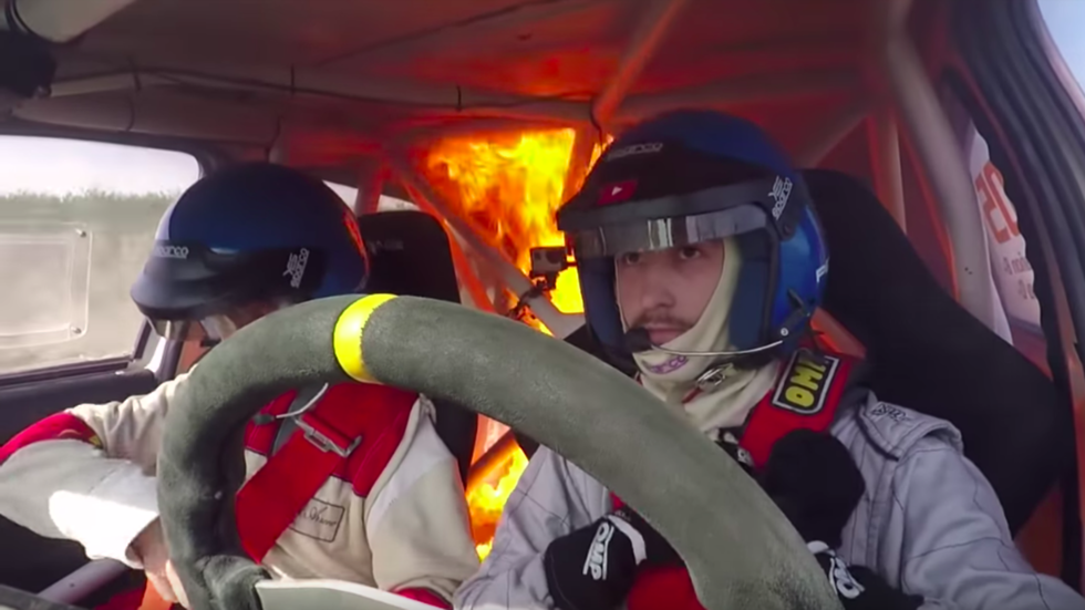 Rally drivers avoid tragedy, escape car as it bursts into flames mid ...
