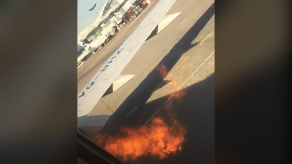 Utair Boeing 737 engine spouts FLAMES on runway just before takeoff ...