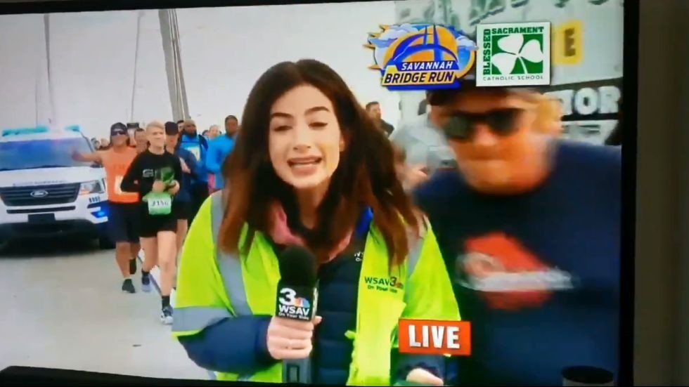 Runner BANNED FOR LIFE for slapping female reporter's backside live on ...