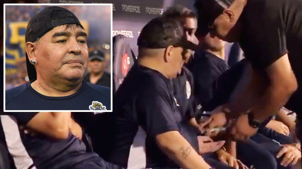 Maradona handed mystery package on the bench as coaches appear to block ...