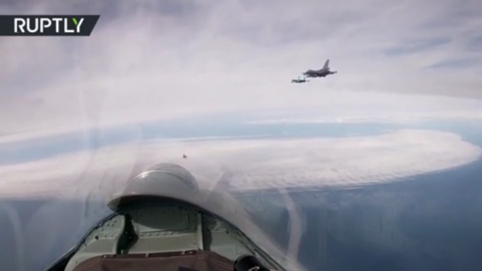 Two Su-27s follow Belgian F-16 fighter jet flying near Russia's border ...