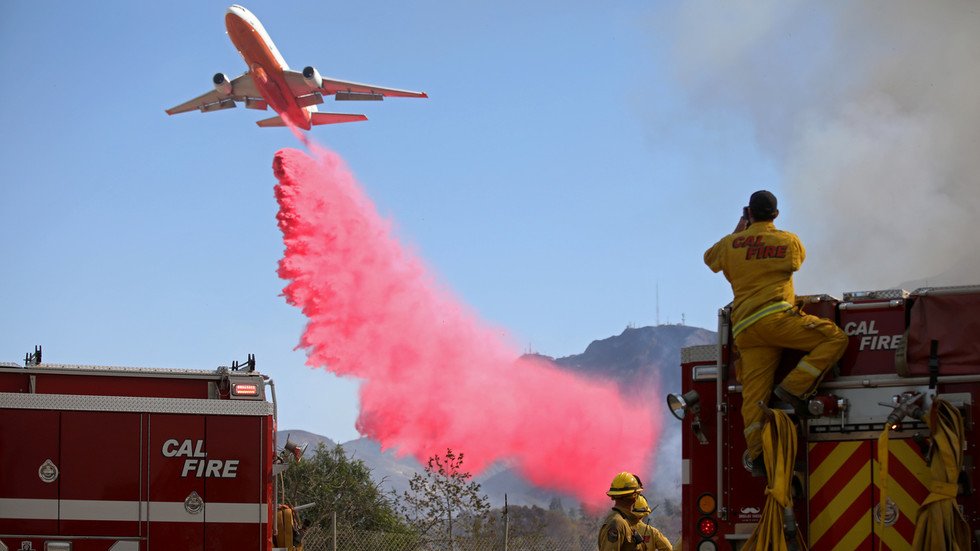 Evacuations underway as firefighters battle massive wildfire in ...