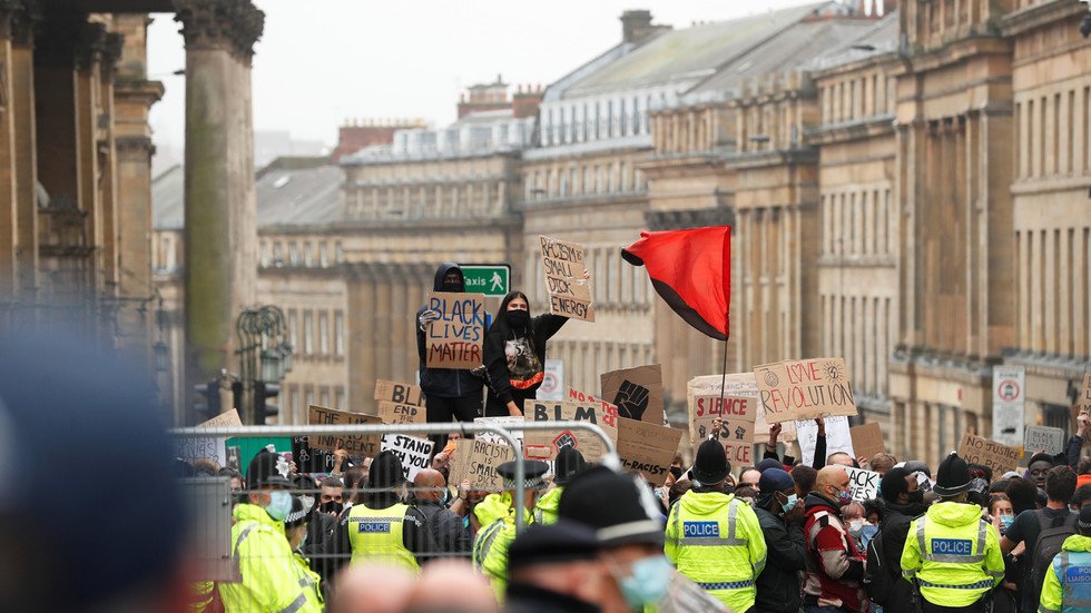 Bottles and smoke bombs thrown as anti-racism rally in Newcastle met by ...