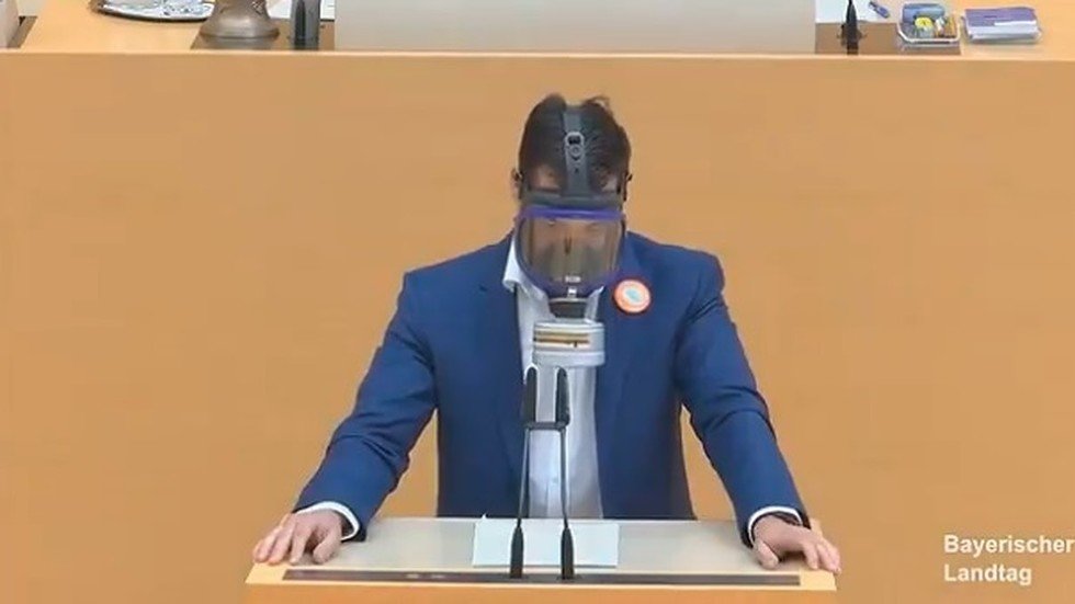 AfD lawmaker shows up wearing GAS MASK in sarcastic nod to German anti ...
