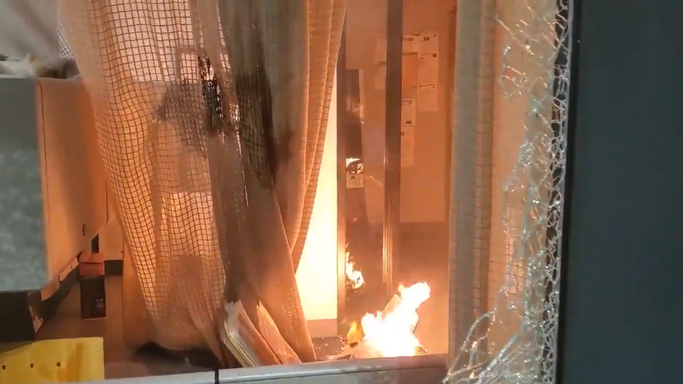 Riot declared after Portland protesters set fire to county office that ...