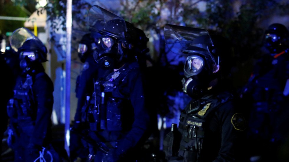 Cop drives motorcycle into Portland BLM protester after being ...