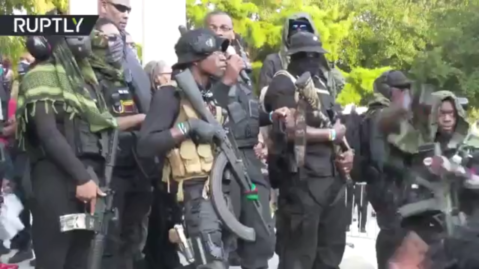 WATCH heavily armed black militia march through the streets of ...