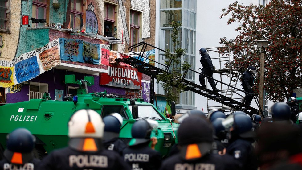Riot police with armored vehicle deployed to evict ‘anarcha-queer ...
