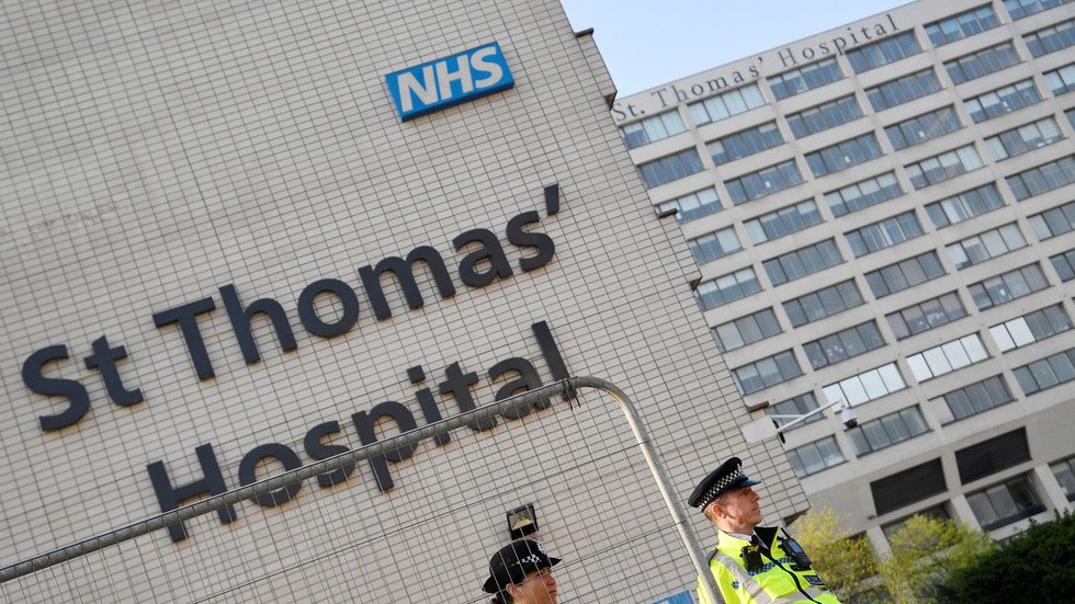 Armed police evacuate area around London hospital and close Westminster ...