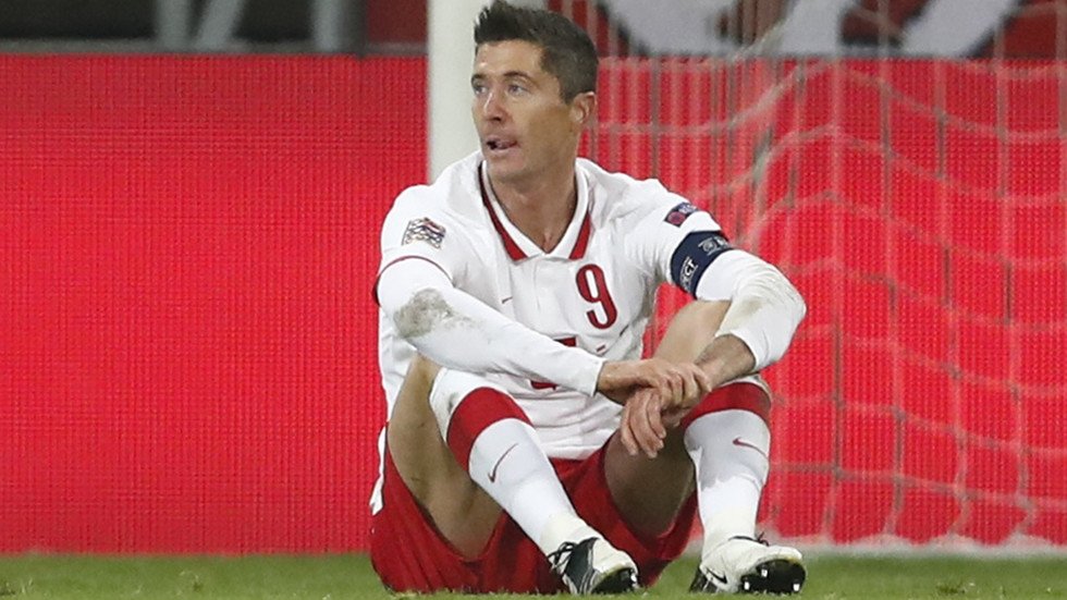 Poles apart: Champions League winner Lewandowski's ex-manager ARRESTED ...