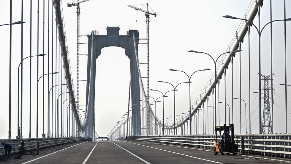 China opens world’s first suspension bridge combining high-speed rail ...