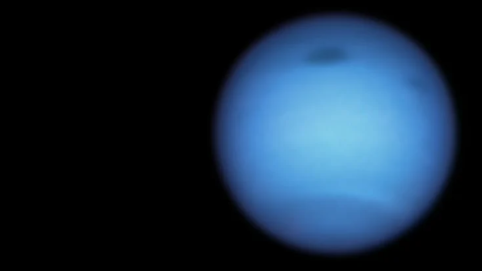 Massive ‘dark vortex’ storm on Neptune just changed direction without ...