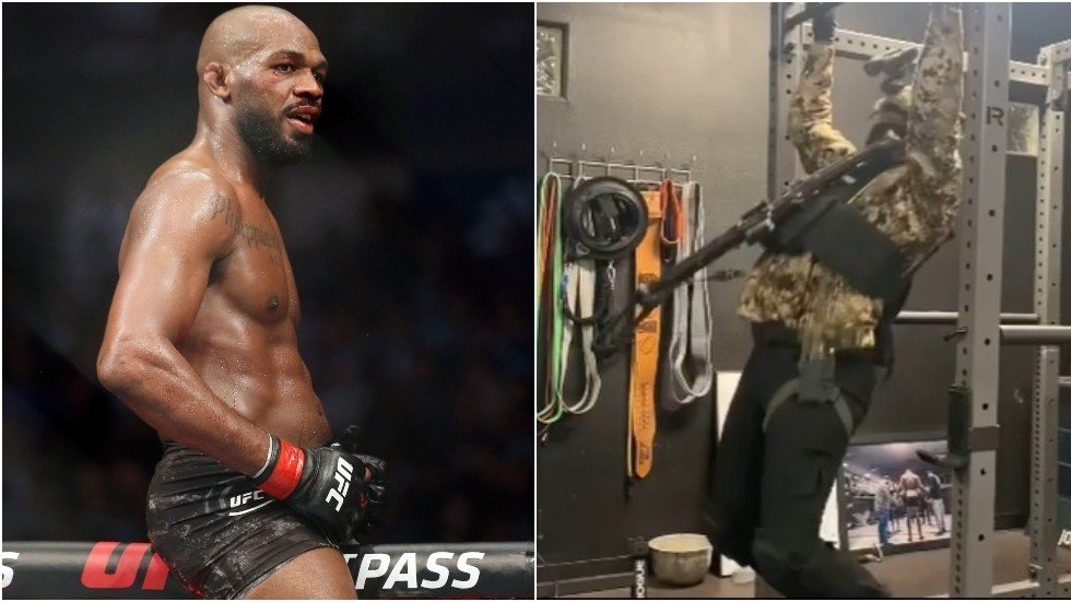 UFC star Jon Jones works out in camo gear with GUN strapped to his ...