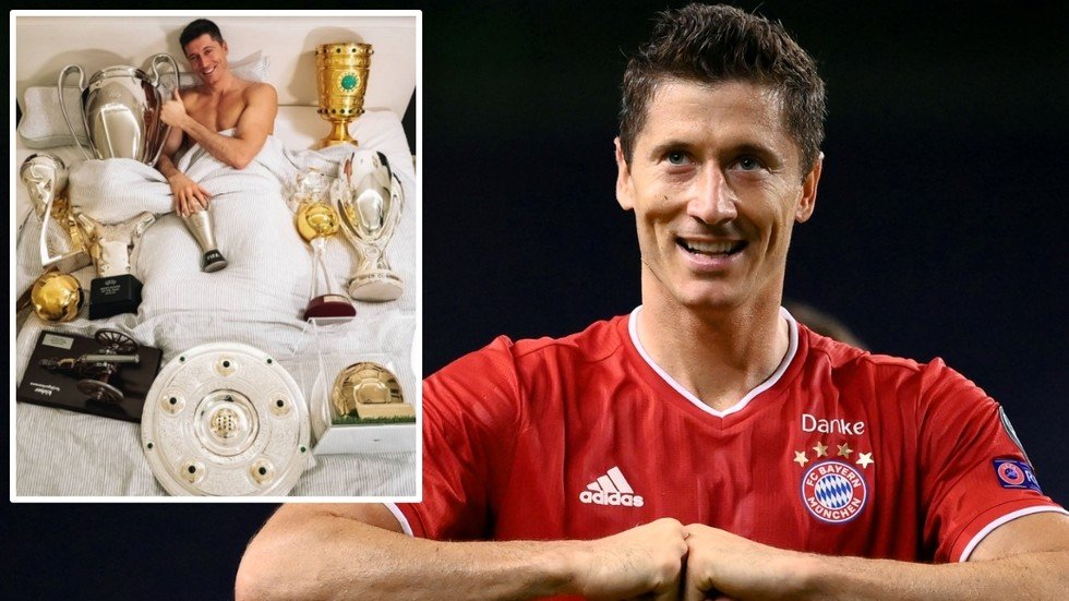 Not bad for a year's work: Robert Lewandowski shows off 12 TROPHIES ...