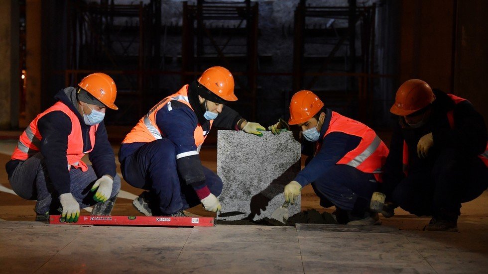 Throwing in the trowel: As construction demand booms, Russia short 1 ...