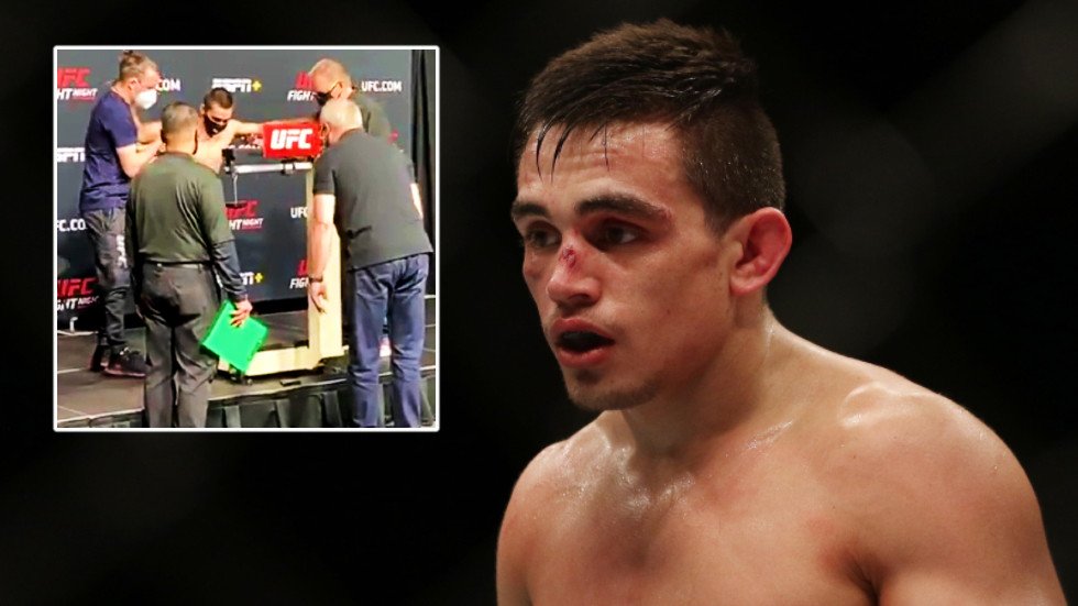‘This is crazy’: Shocking scenes as UFC fighter struggles to stand ...