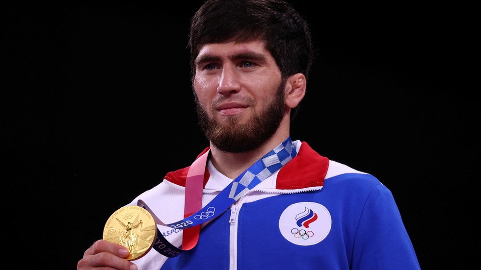 Russian wrestler Zaur Uguev completes impressive treble with Tokyo gold ...