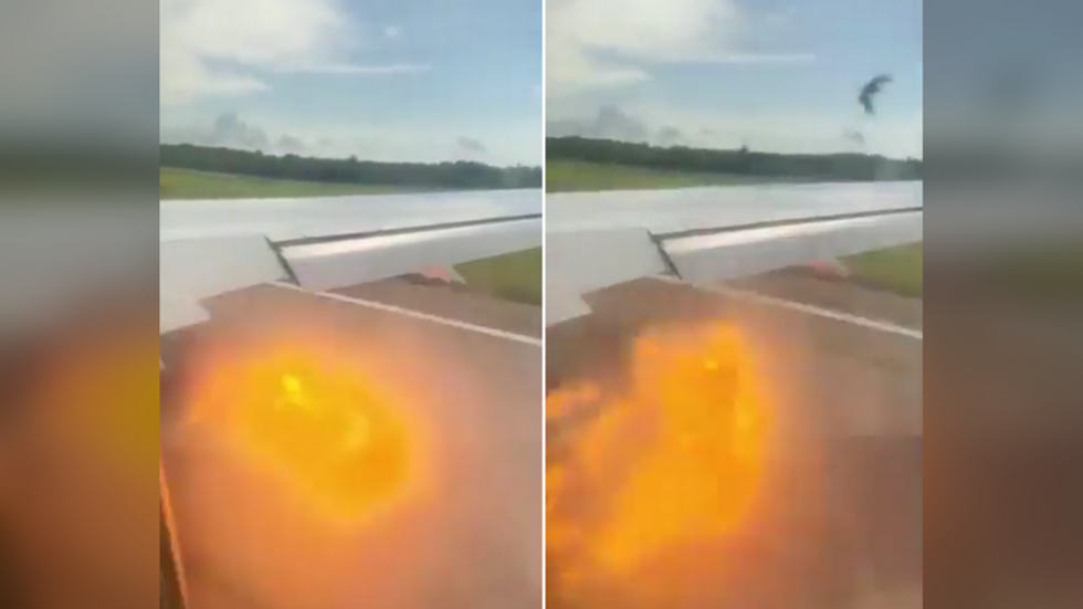 WATCH passenger jet spew flames as it strikes a flock of EAGLES on ...