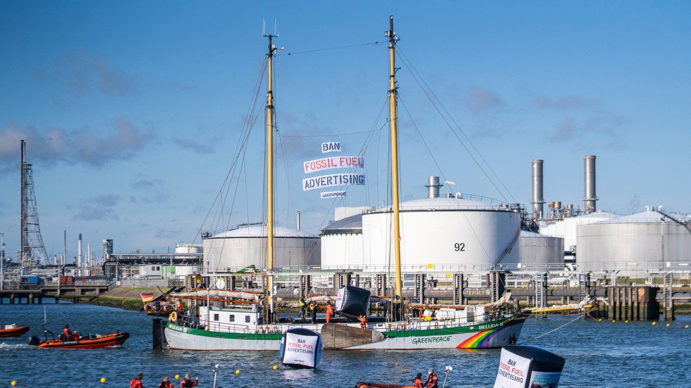 Dozens of environmental activists block Shell’s oil refinery in ...