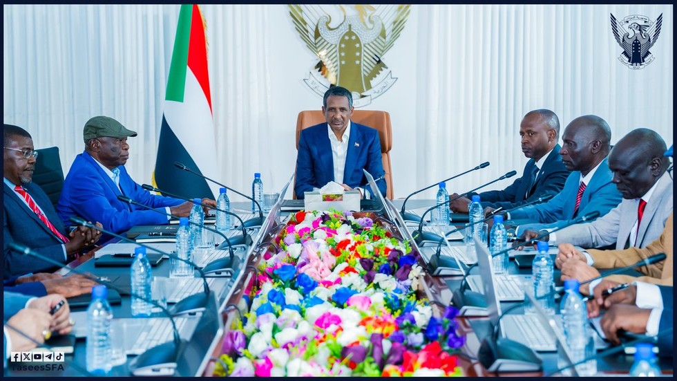 Militia chief sworn in as head of rival government in African state ...