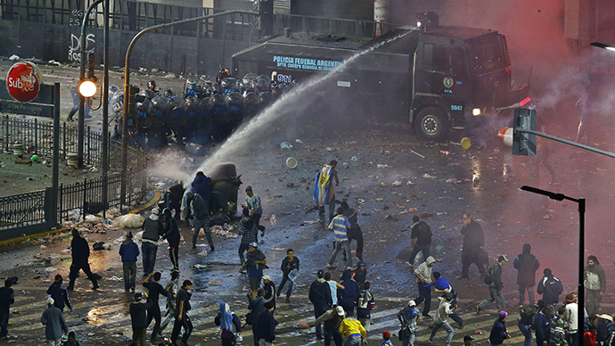 Argentina riot police clash with fans after World Cup loss (VIDEO ...