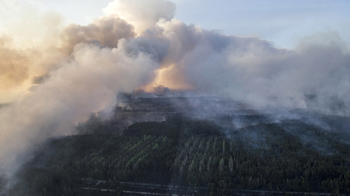 Chernobyl fire: Kiev claims no radiation threat, experts ring alarm ...
